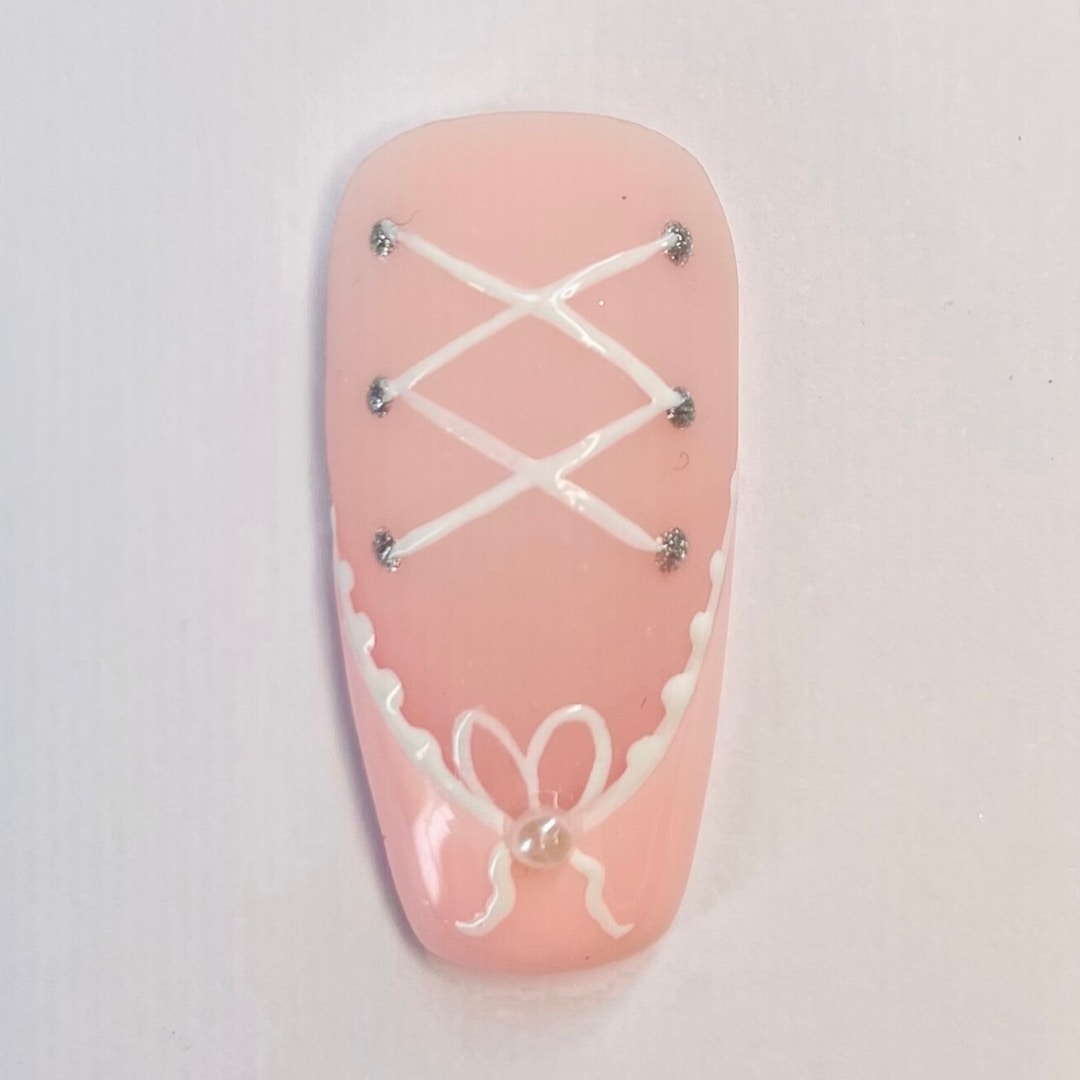 How to create an on-trend & en pointe balletcore nail look – Scratch